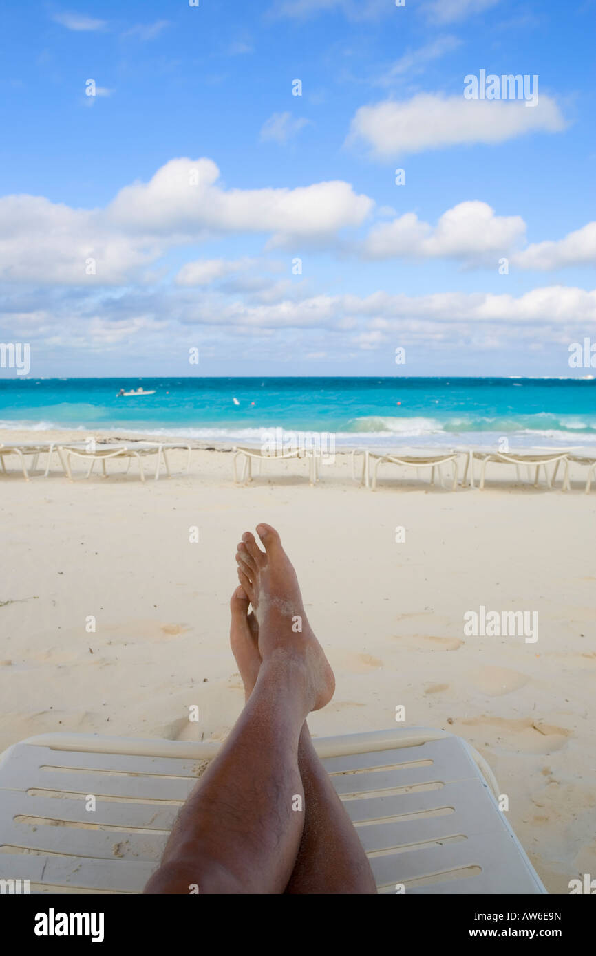 Relaxing with her feet up on a chair hi-res stock photography and ...
