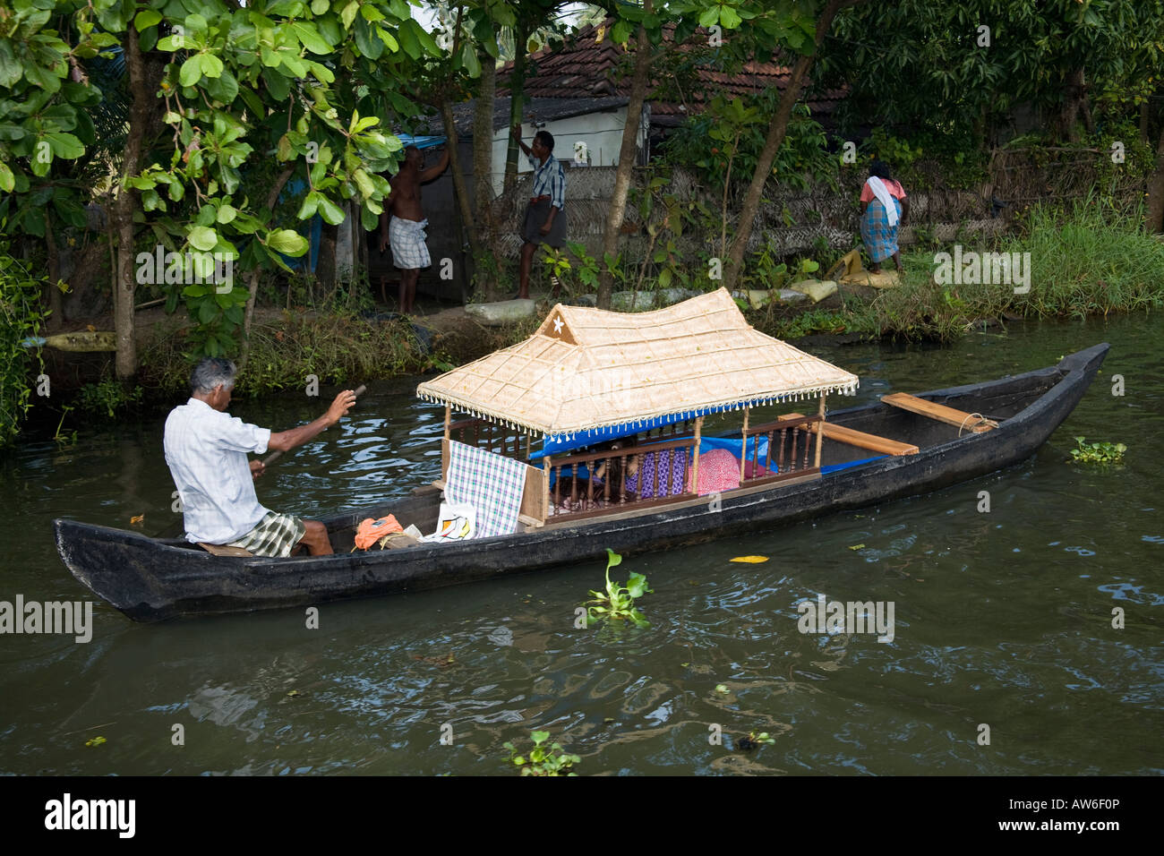 Indian man boatman rowing boat hi-res stock photography and images - Alamy