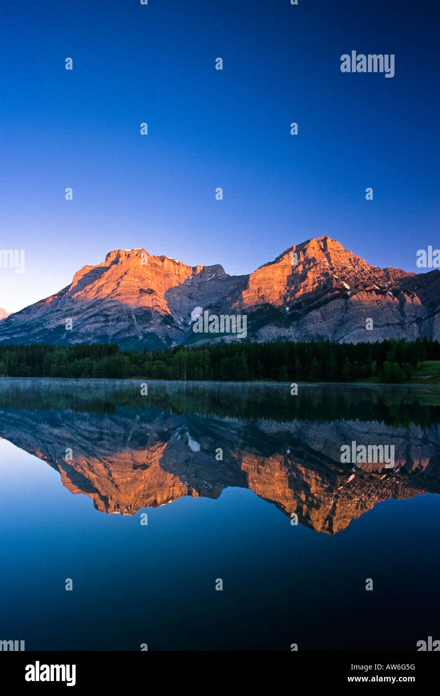 Mount Kidd reflected in Wedge Pond, Kananaskis Country, Alberta, Canada ...