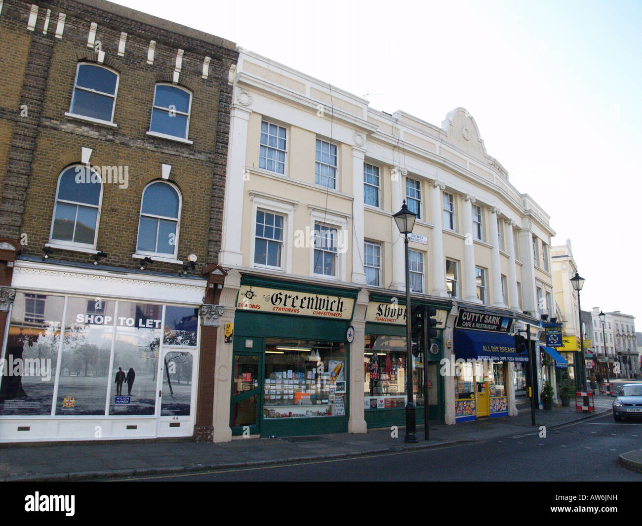high street st shops fronts shop windows consumer Stock Photo - Alamy