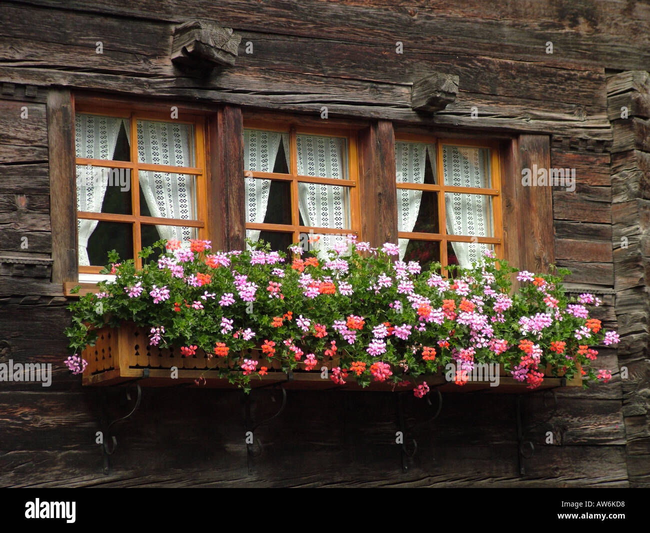 Traditional swiss chalet window boxes hi-res stock photography and ...