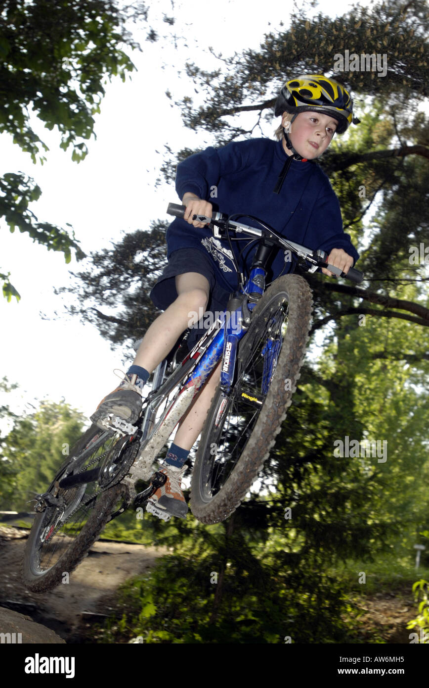 Boys jumping with bikes hi-res stock photography and images - Alamy