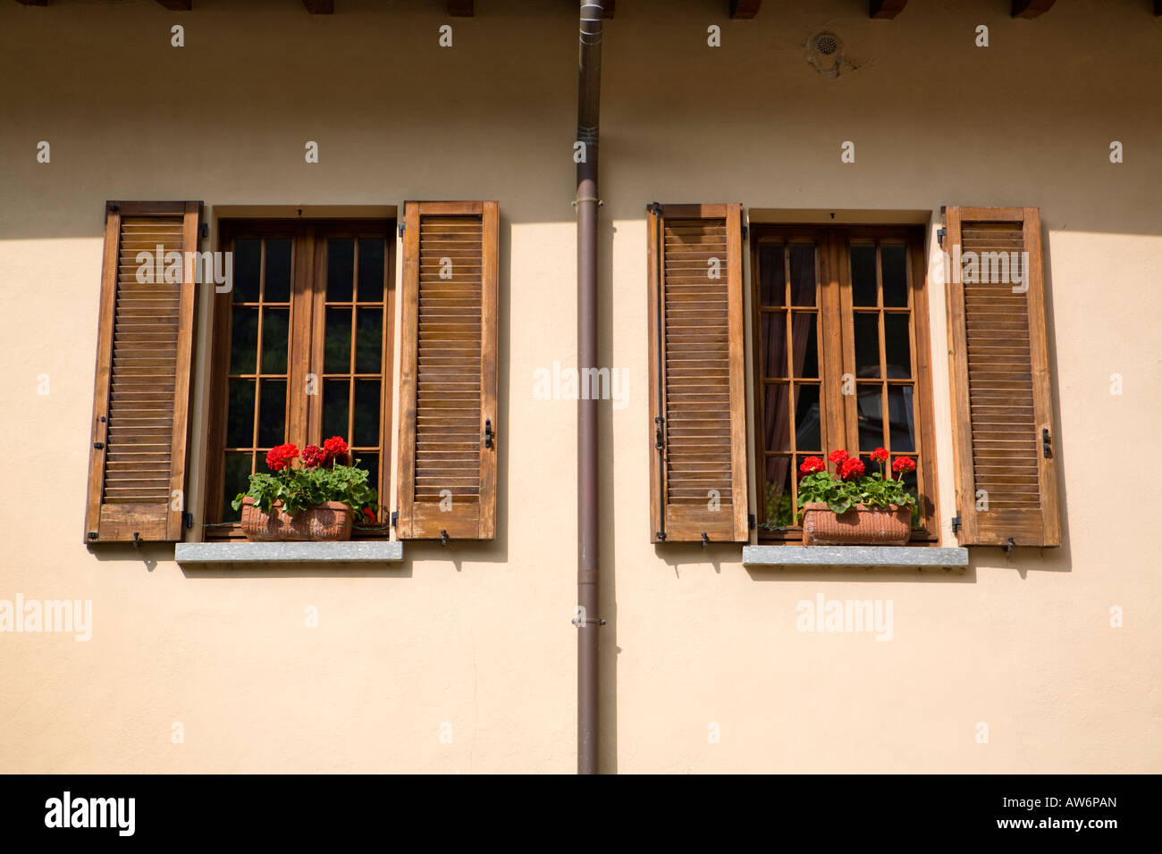 Two windows with shutters in Varenna, Italy Stock Photo - Alamy