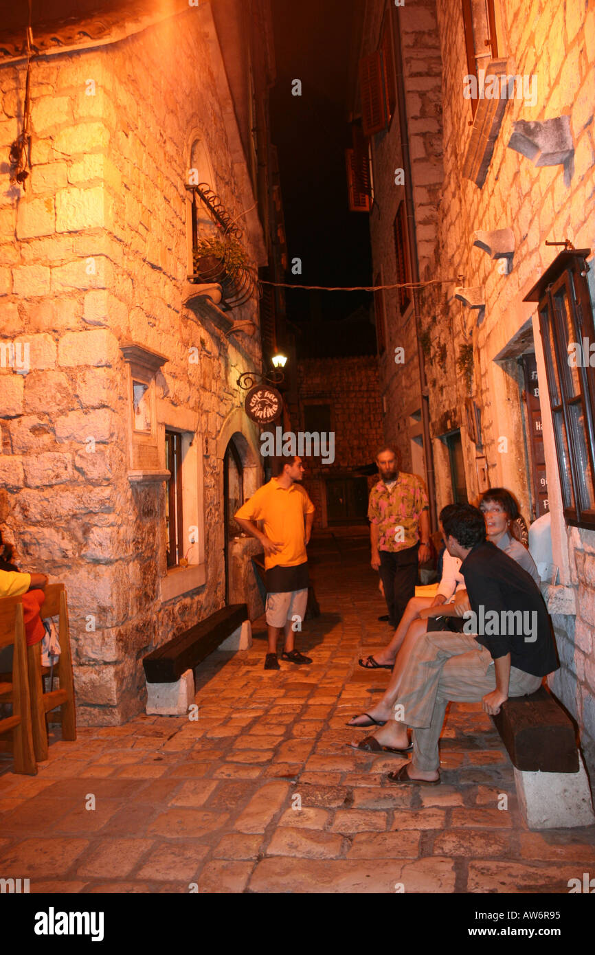 People on the street of Stari Grad town at night Stock Photo - Alamy