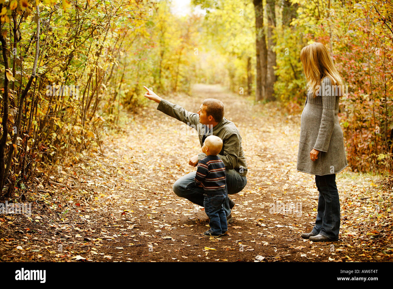 Family out for a walk Stock Photo - Alamy