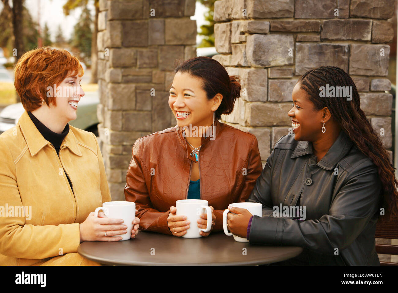 Three women together Stock Photo - Alamy