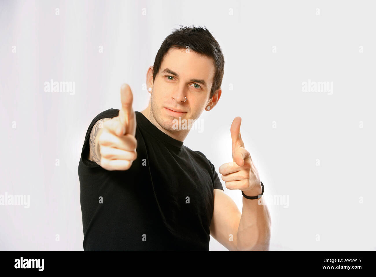 Man pointing ahead Stock Photo - Alamy
