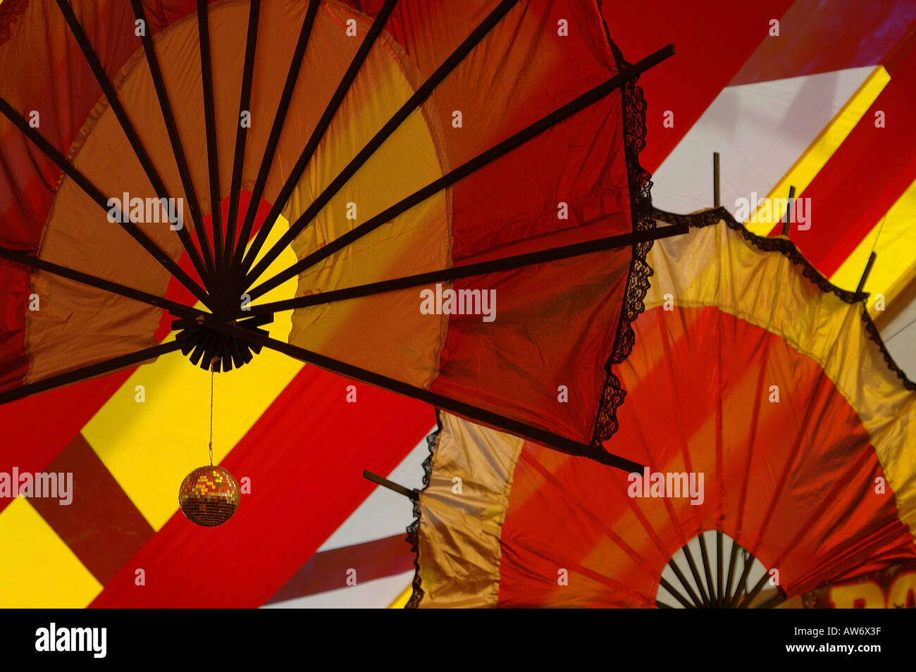 abstract of red and yellow fans inside a big top tent Stock Photo - Alamy