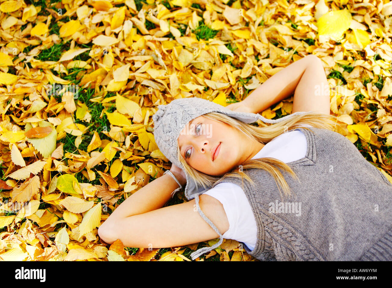 Teenage girl laying down Stock Photo - Alamy
