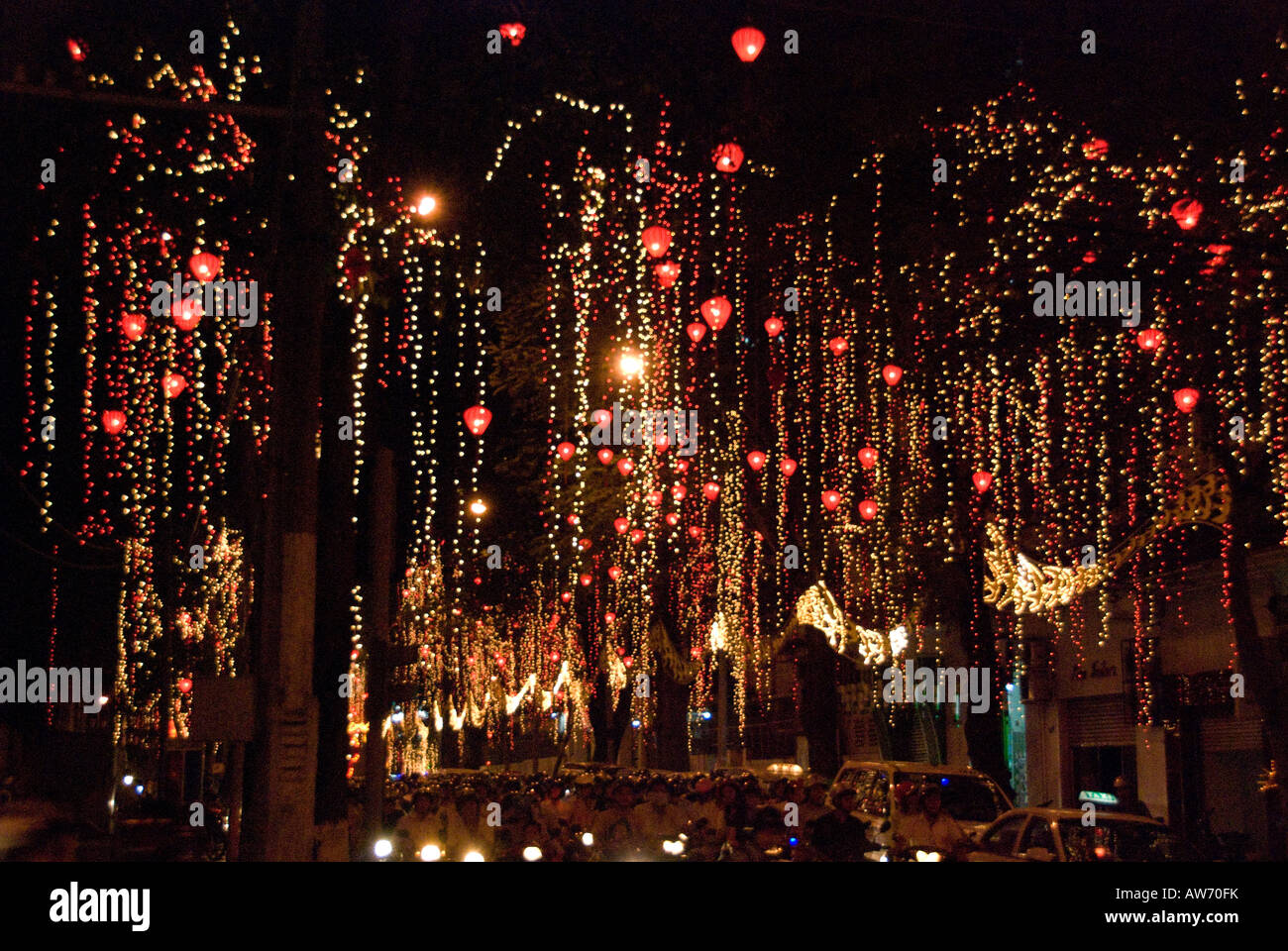 Fairylights, streamers and lanterns provide an overhead canopy of light ...