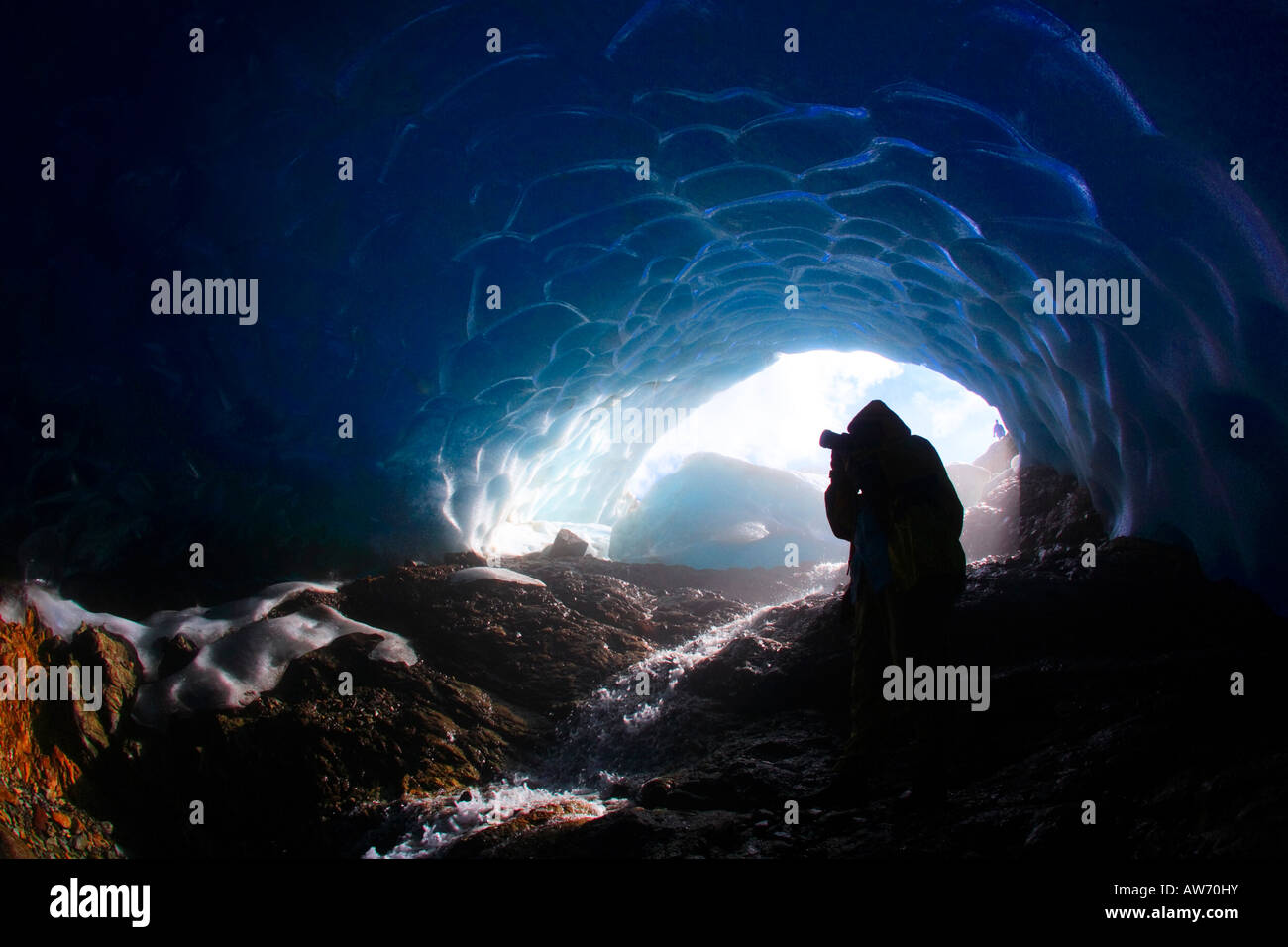 Person in a cave Stock Photo - Alamy