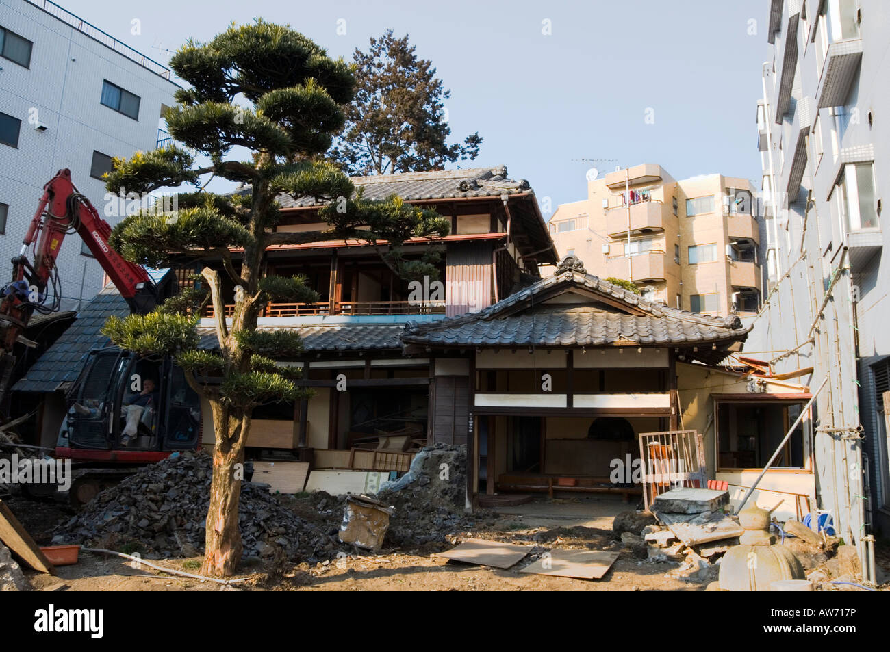 Traditional building being torn down to build an apartment block in ...