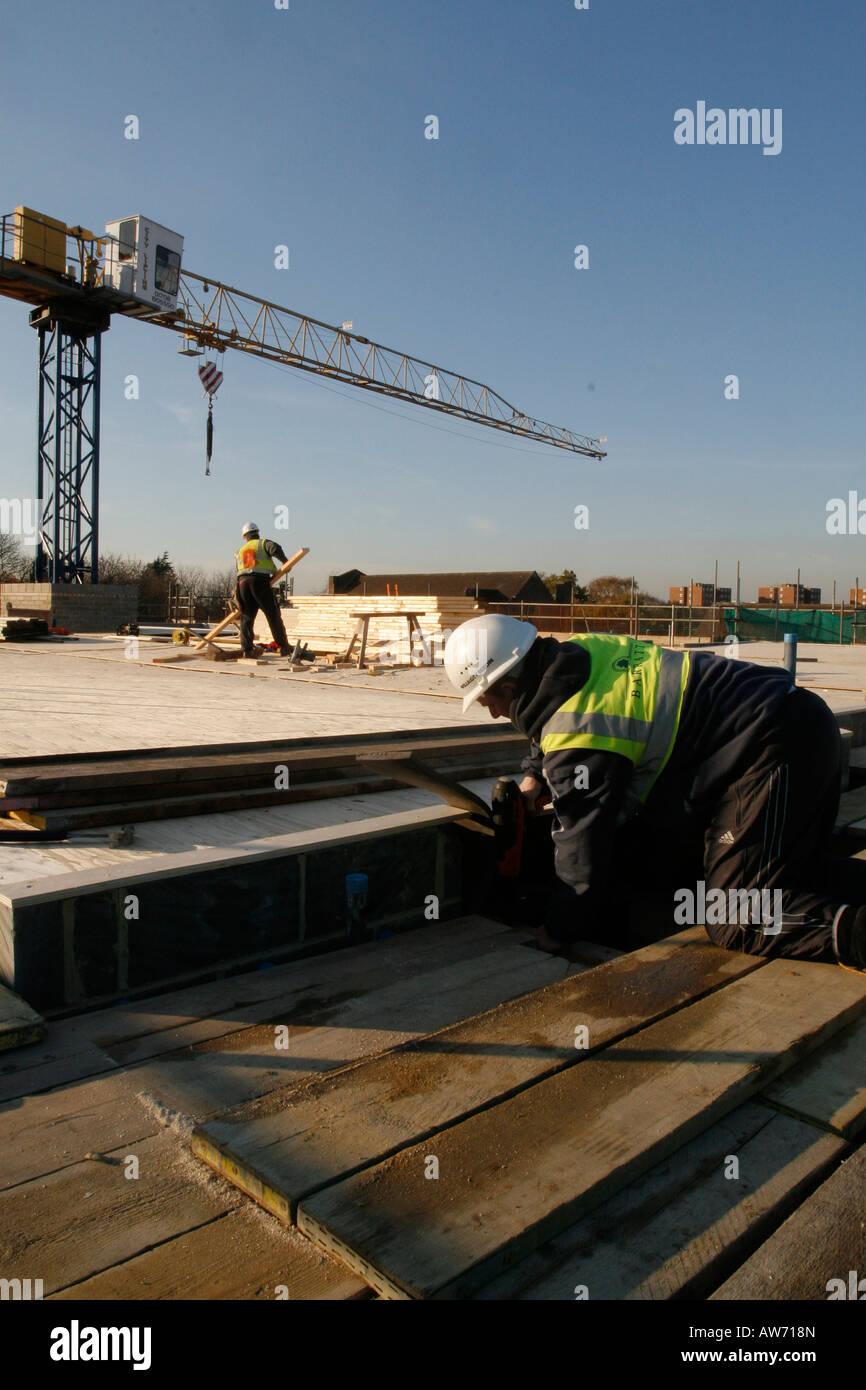 Construction workers at work Stock Photo - Alamy