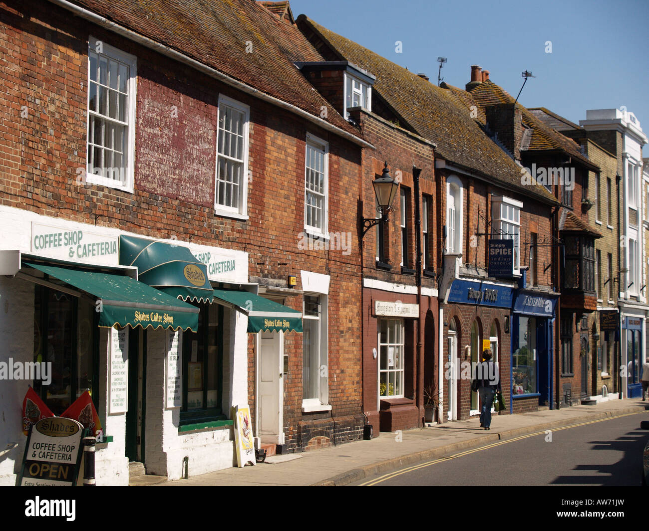 red brick shop fronts windows canopy walker uphill Stock Photo - Alamy