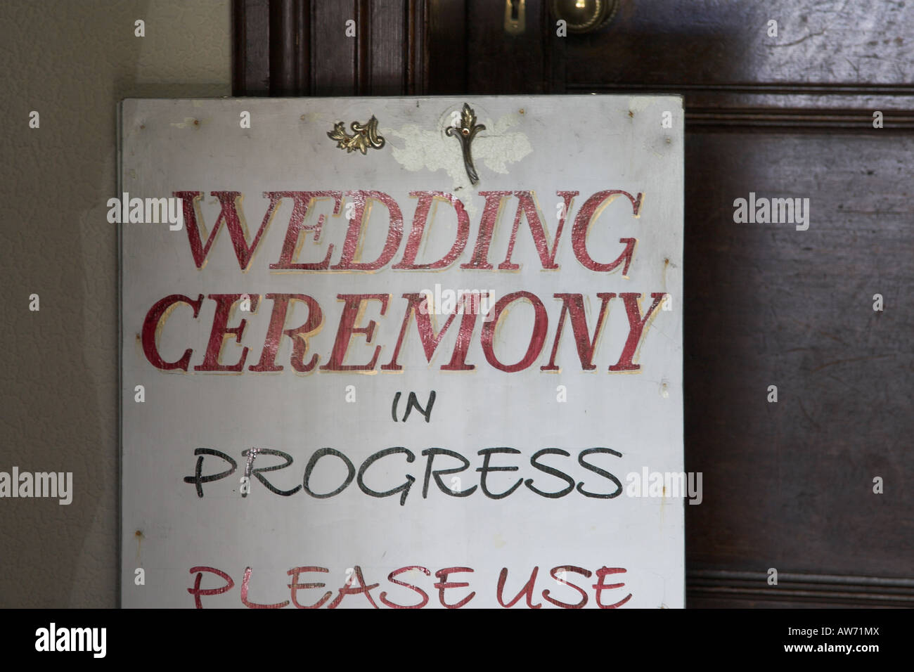 Wedding ceremony in progress sign Stock Photo - Alamy