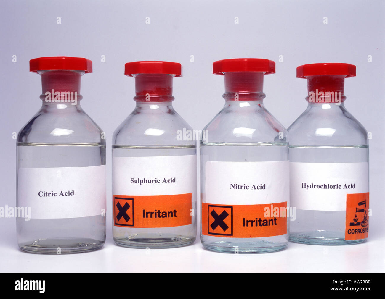 Bottles of laboratory acids with hazard labels Stock Photo - Alamy Bottles of laboratory acids with hazard labels Stock Photo - Alamy
