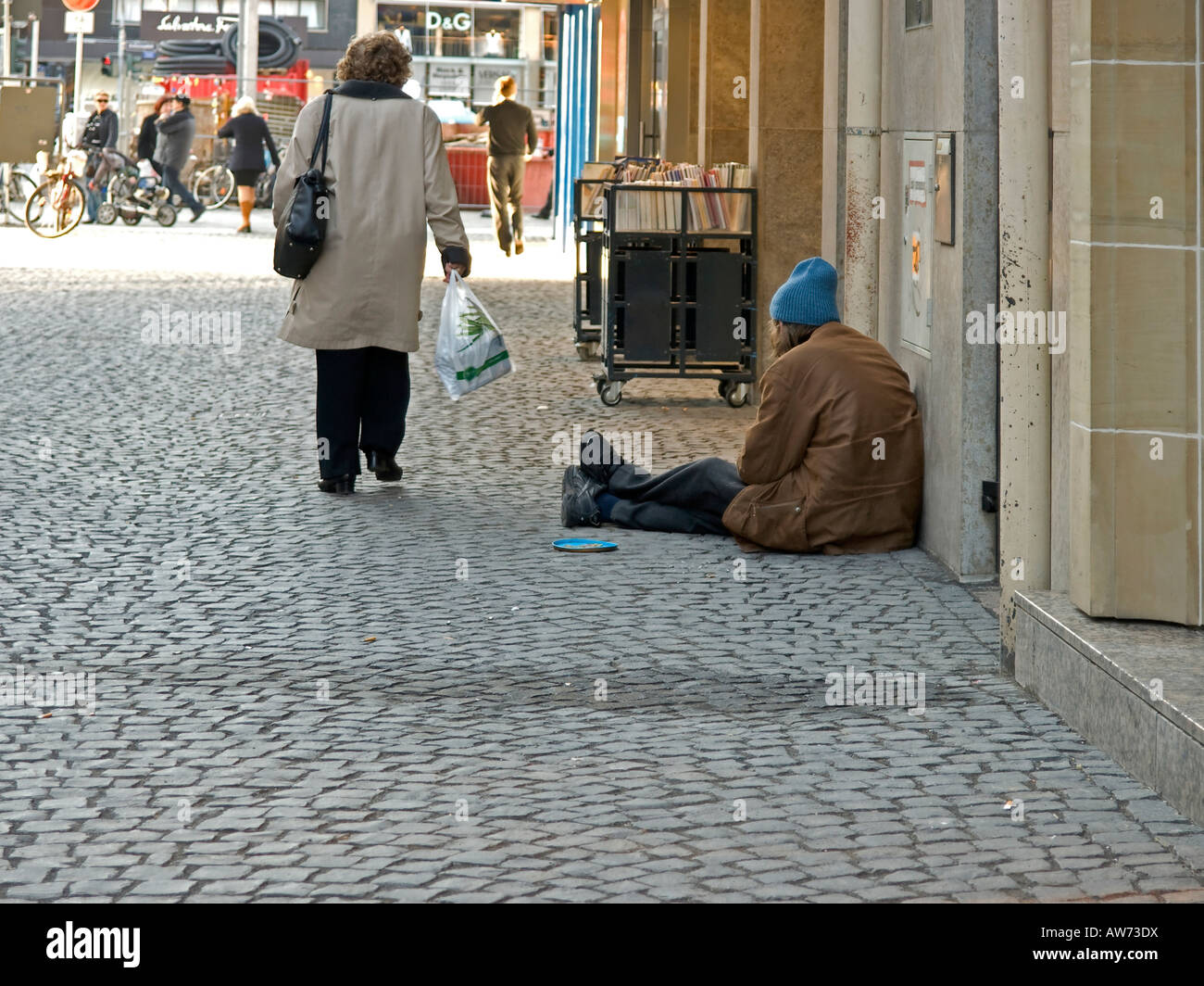 homeless person beggar on pavement in the city of Frankfurt am Main ...