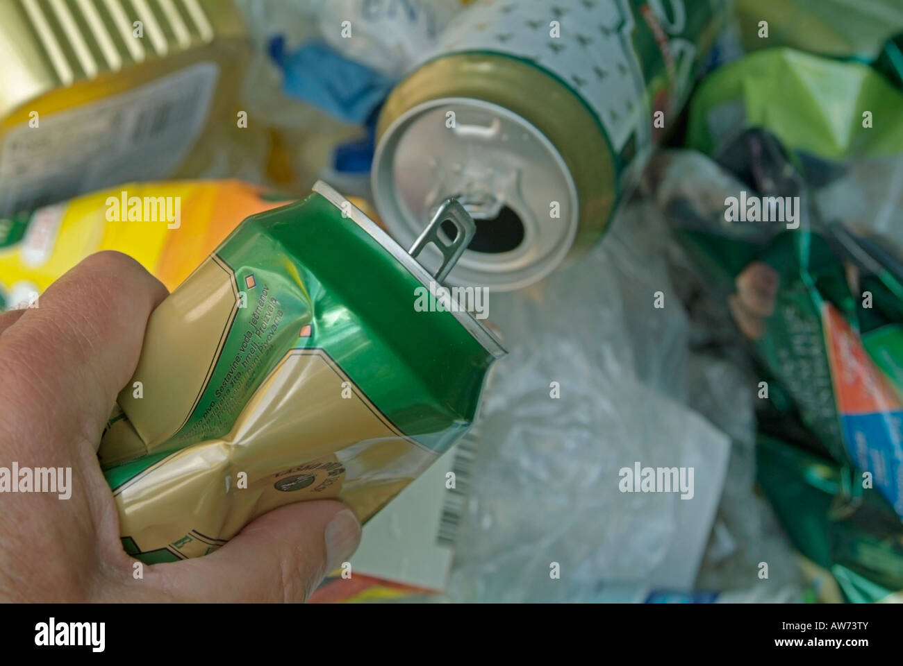 collecting tins cans separating waste waste separation hand pressing a ...