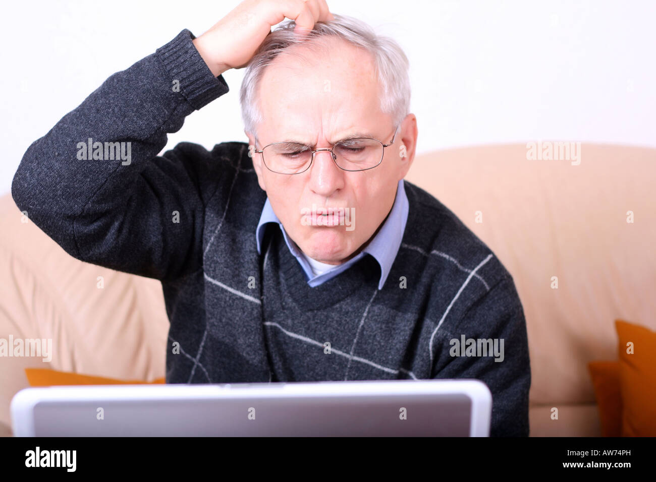Confused grandfather using pc hi-res stock photography and images - Alamy