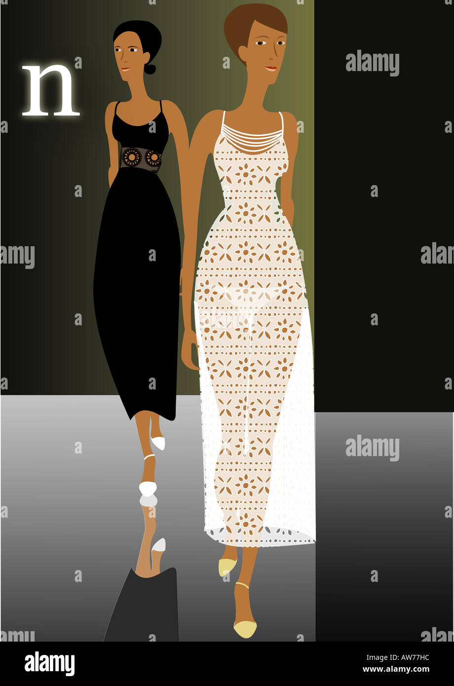 Two models walking down the runway Stock Photo - Alamy