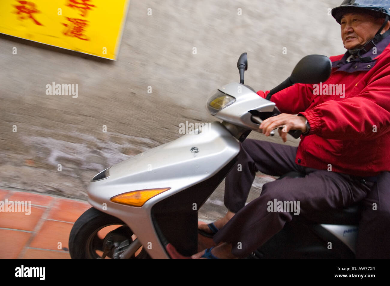 Stock photo of an elderly man riding a scooter in Lukang Taiwan Stock ...