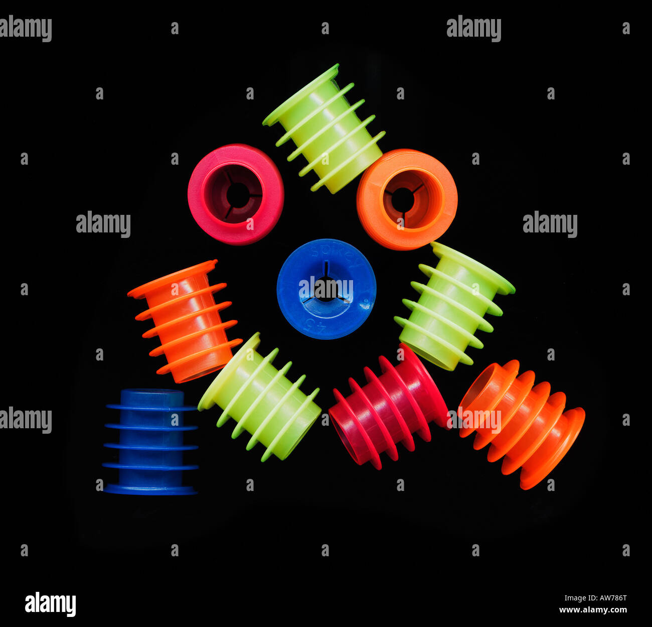 colored objects on black background Stock Photo - Alamy