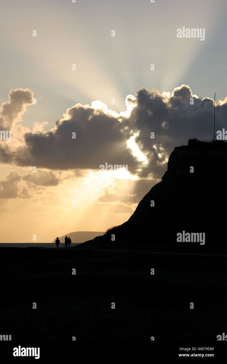 Spectacular sunset with walkers silhouetted Stock Photo - Alamy