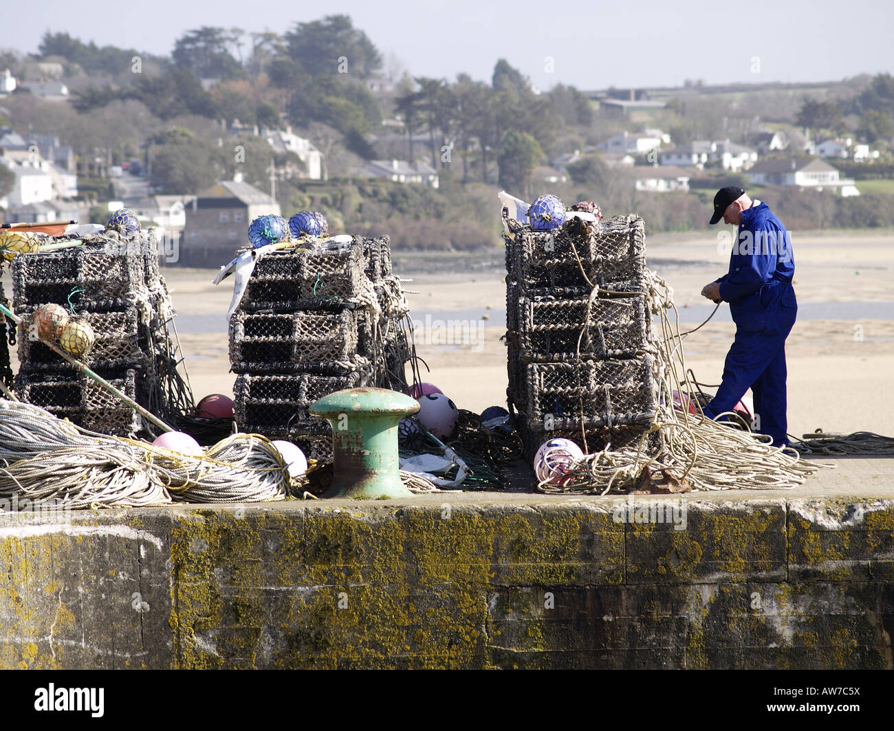 Fisherman preparing lobster pots Stock Photo - Alamy