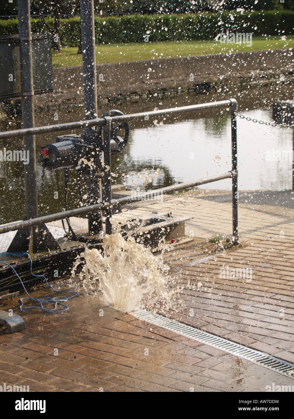 blowback water vent lock filling splash foaming Stock Photo - Alamy
