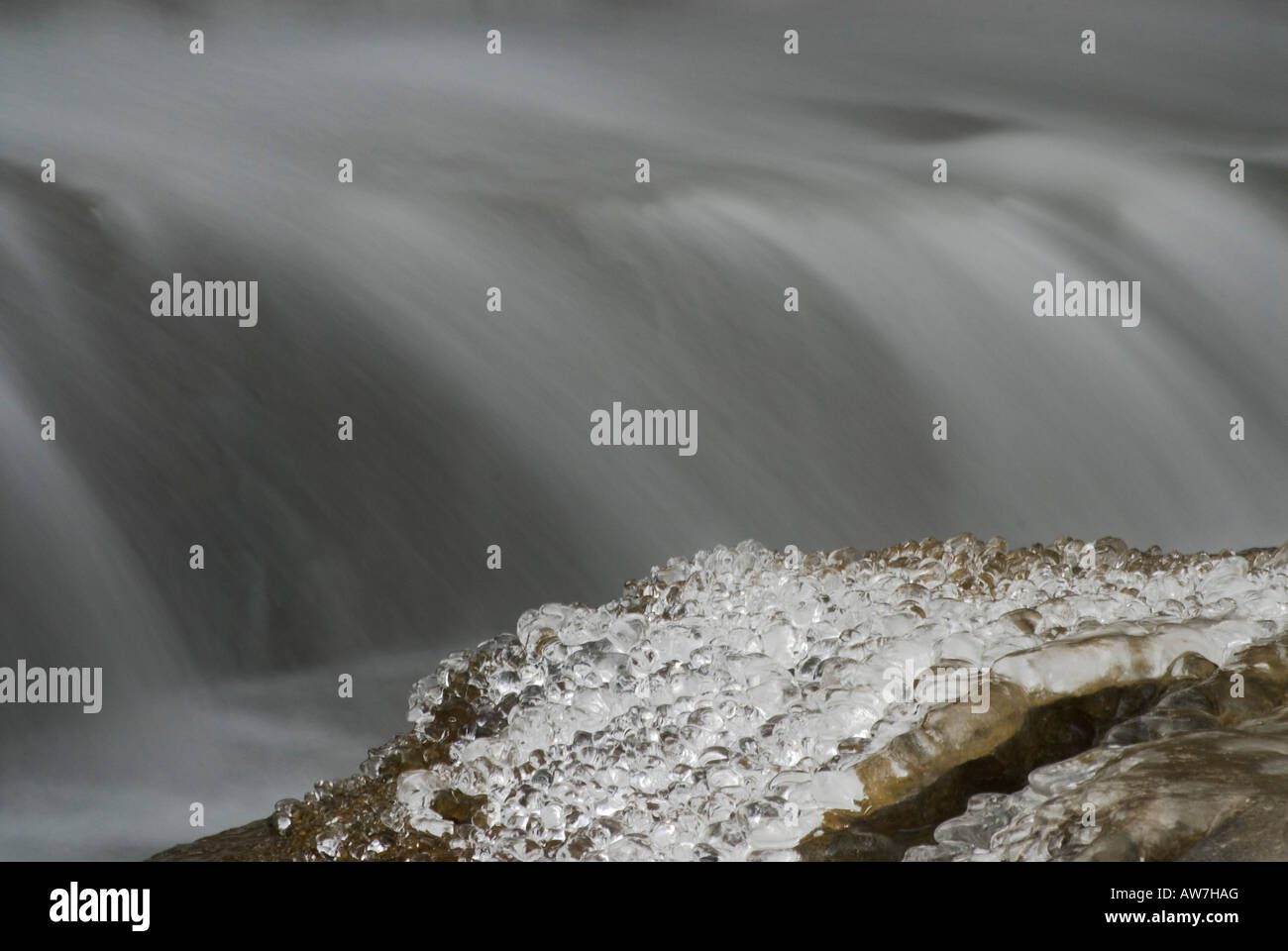 ice on boulder,waterfall detail Stock Photo - Alamy
