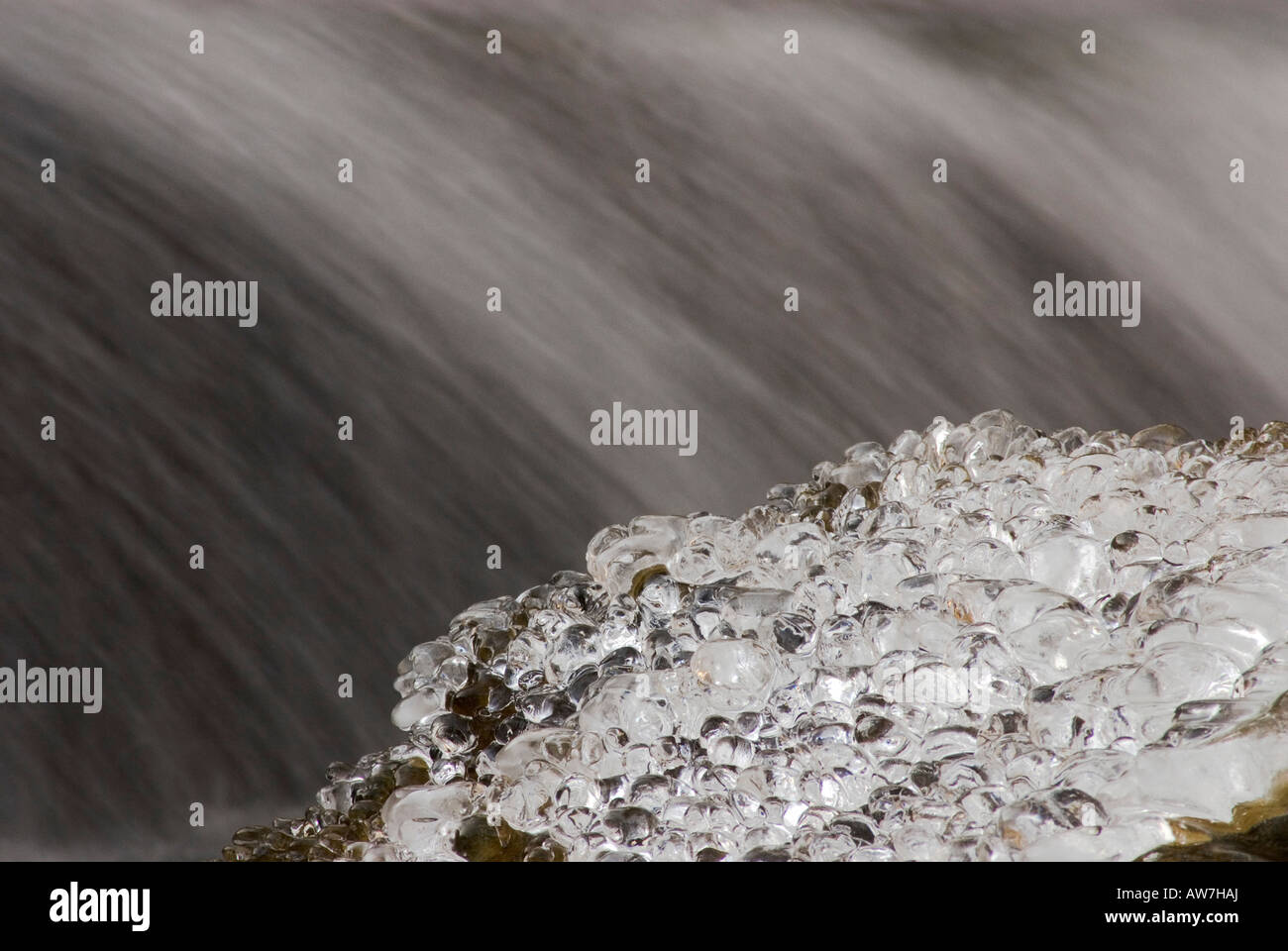ice on boulder,waterfall detail Stock Photo - Alamy
