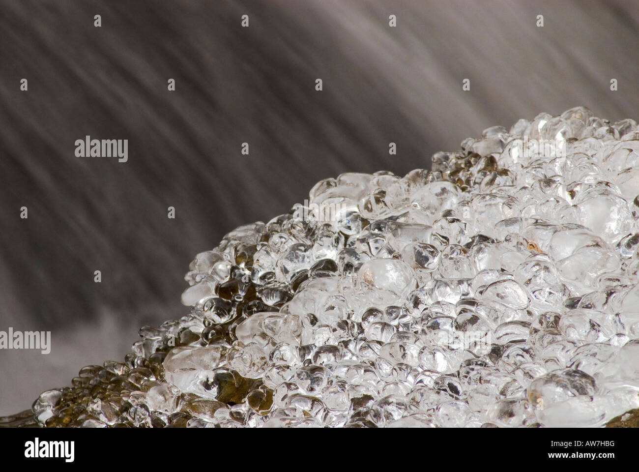 ice on boulder,waterfall detail Stock Photo - Alamy
