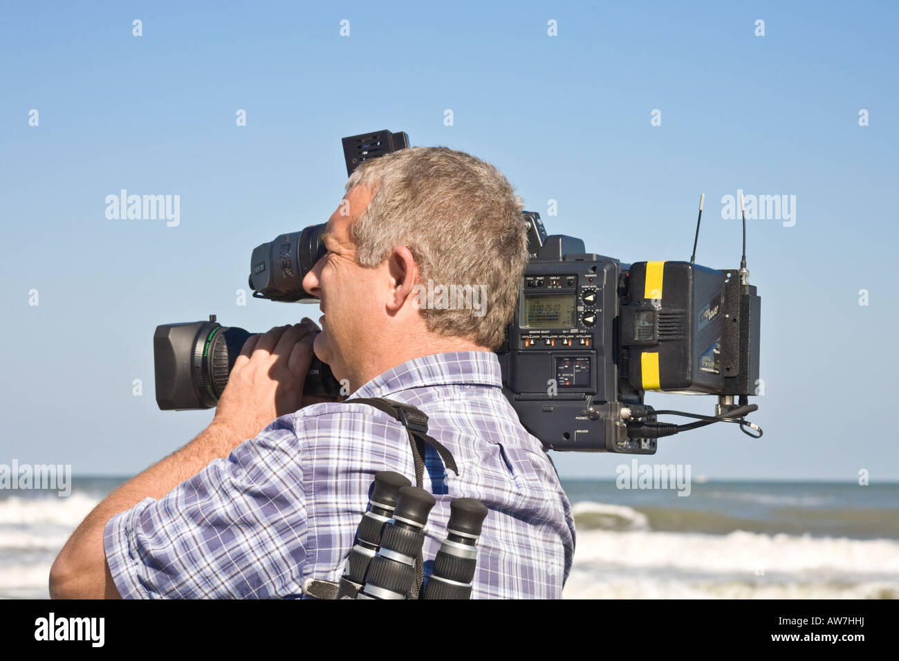A TV cameraman at the beach Florida, USA Stock Photo - Alamy