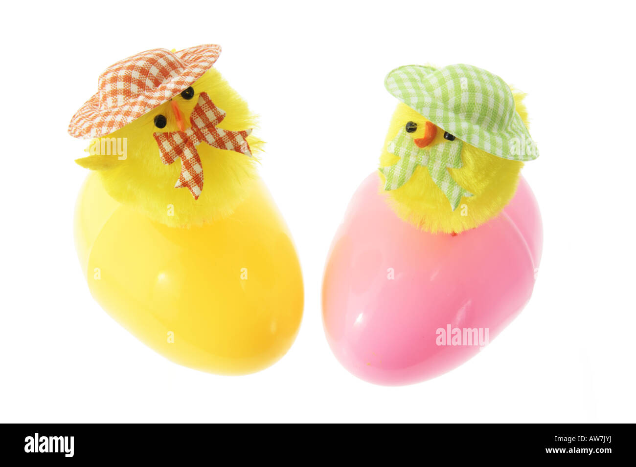 Toy Chicks on Plastic Easter Eggs White Background Stock Photo - Alamy