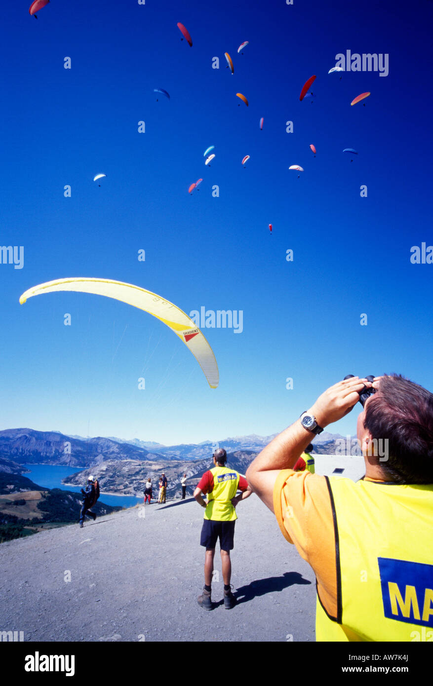 paragliders flying in competition.view from launch site Stock Photo - Alamy