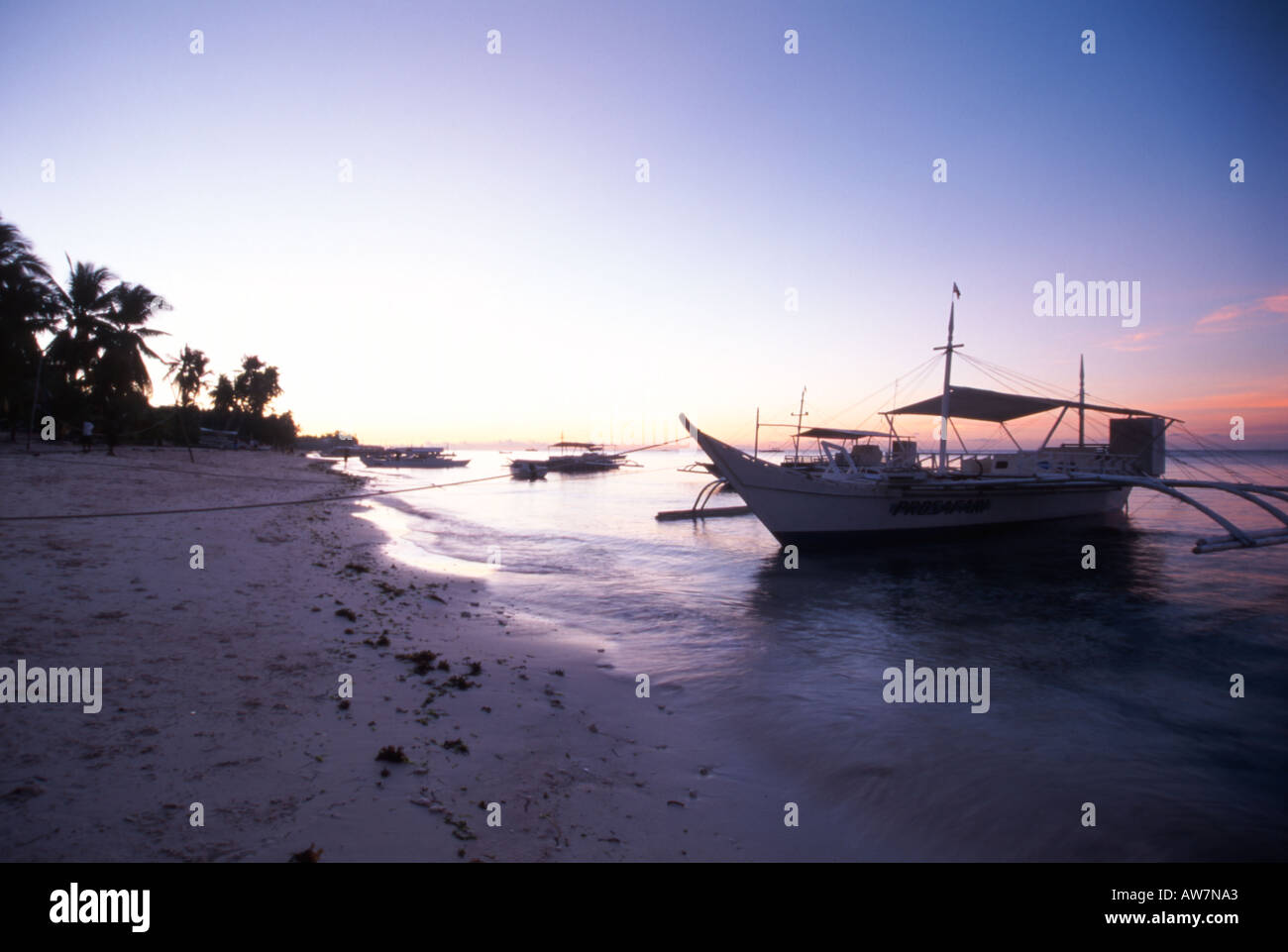 A tropical sunset over Panglao Island in the Southern Philippines Stock ...