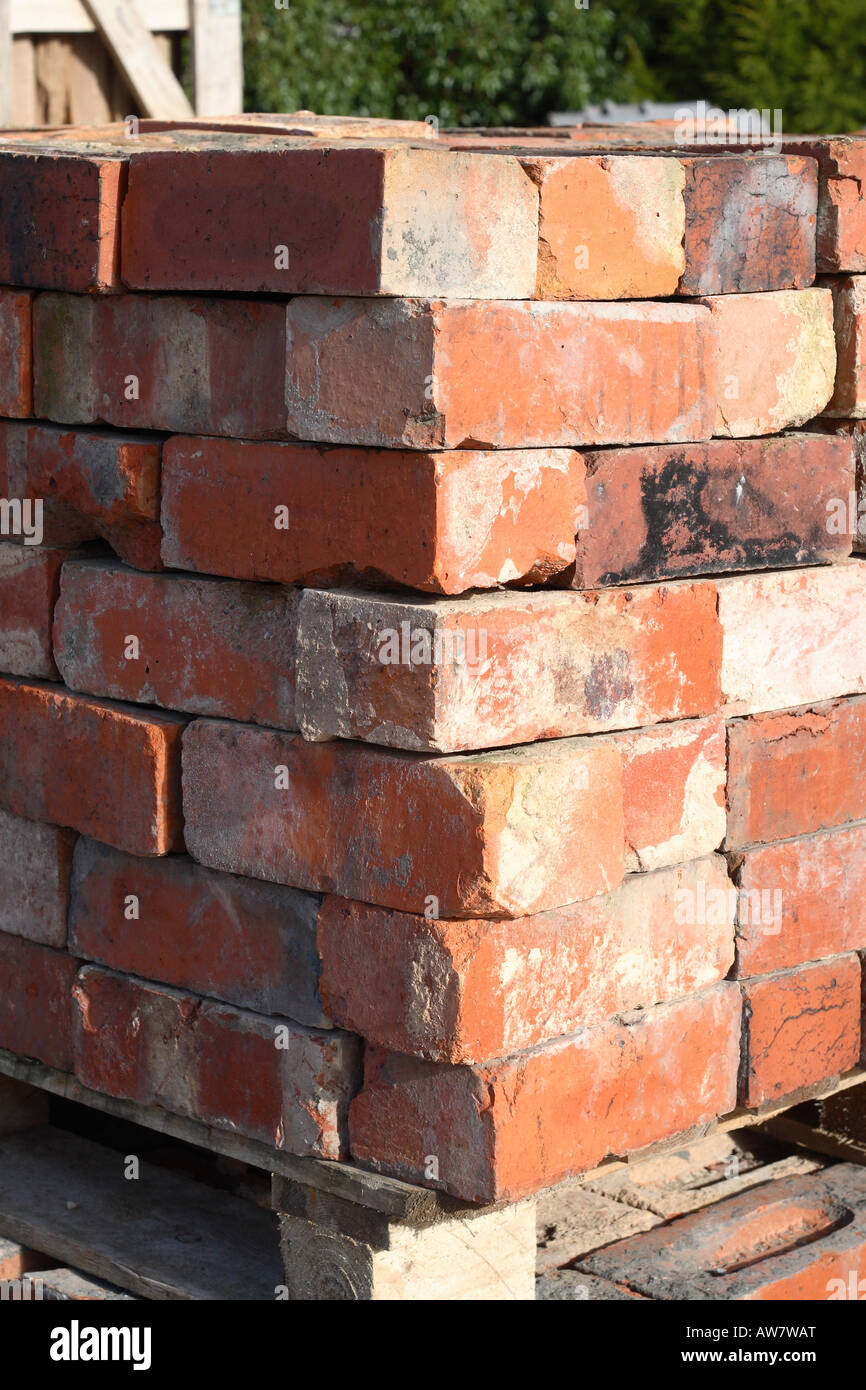 Old used reclaimed red brick stack at a building material reclamation ...