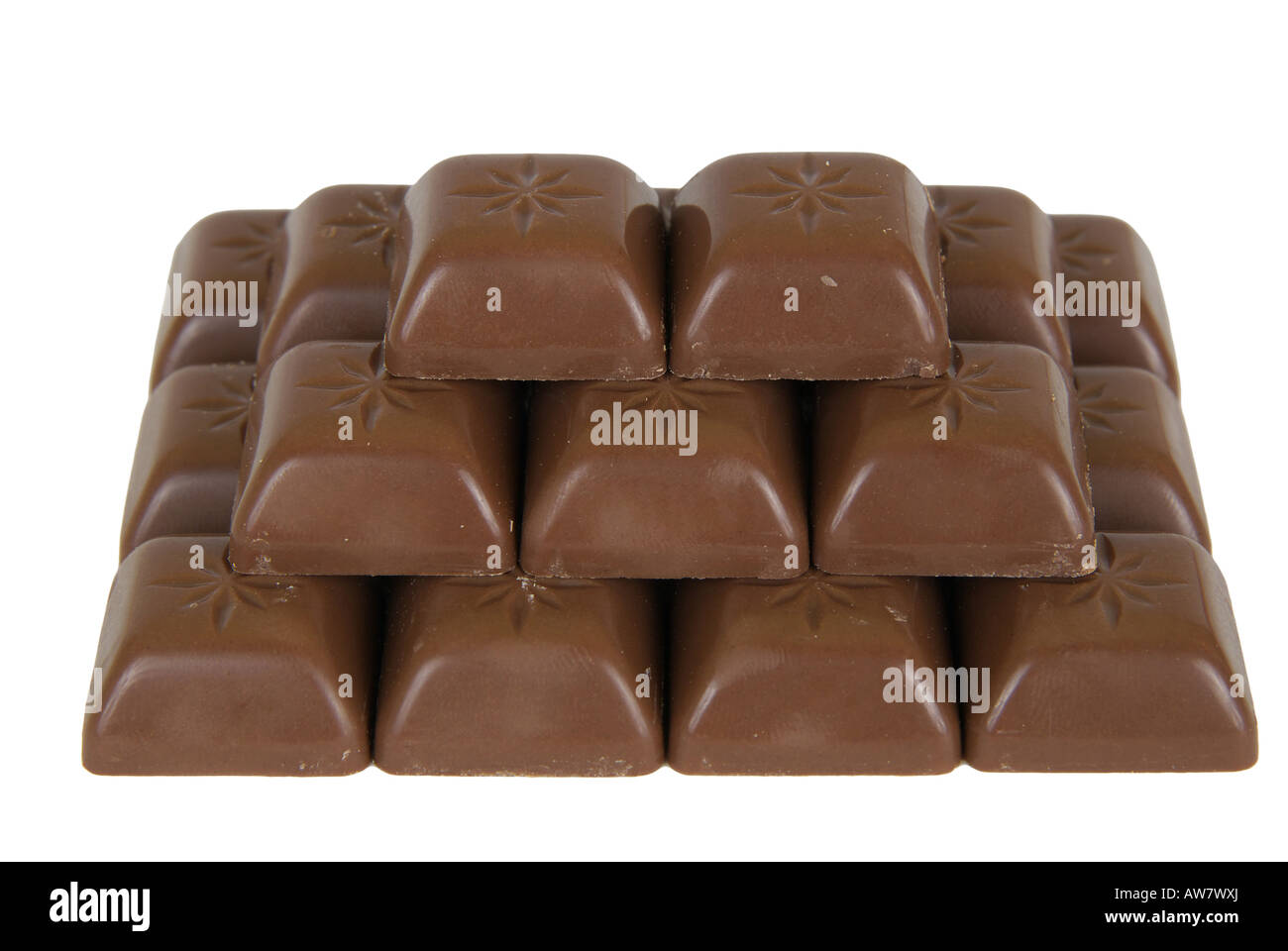 Chocolate forming a pyramid White background Stock Photo - Alamy