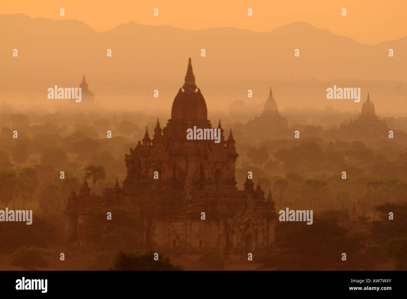 Sun rise above the temples and pagodas of the old ruined city Bagan ...