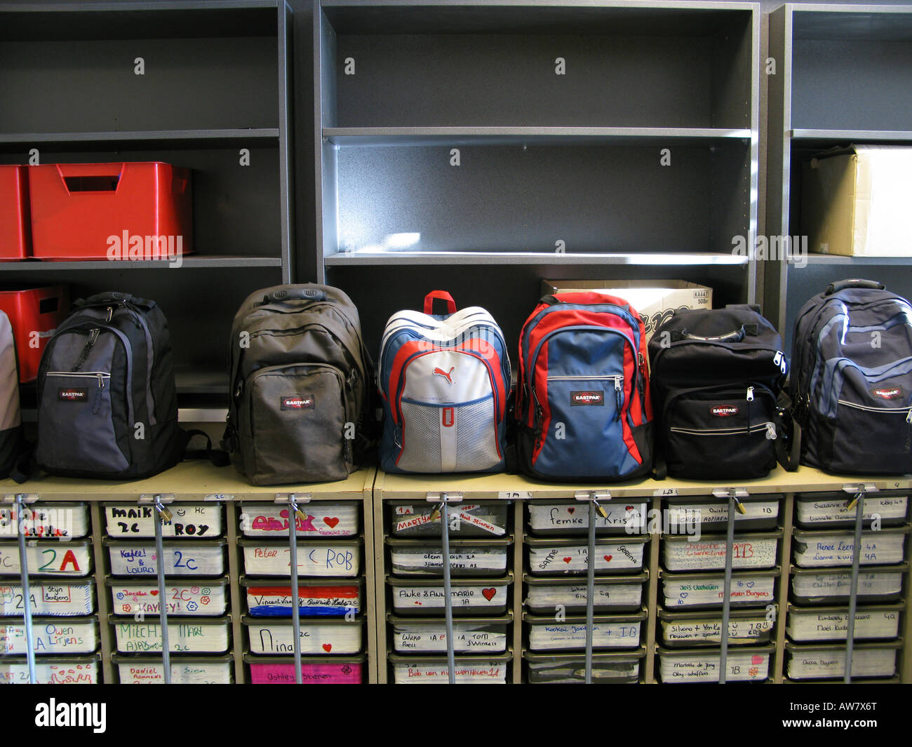 rucksacks at school with student lockers Stock Photo - Alamy