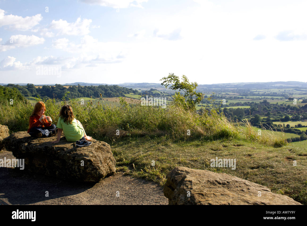 Two children enjoying the view from Ham Hill, Somerset, England Stock ...