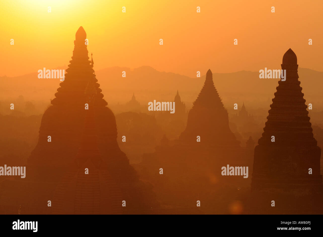 Sun rise above the temples and pagodas of the old ruined city Bagan ...