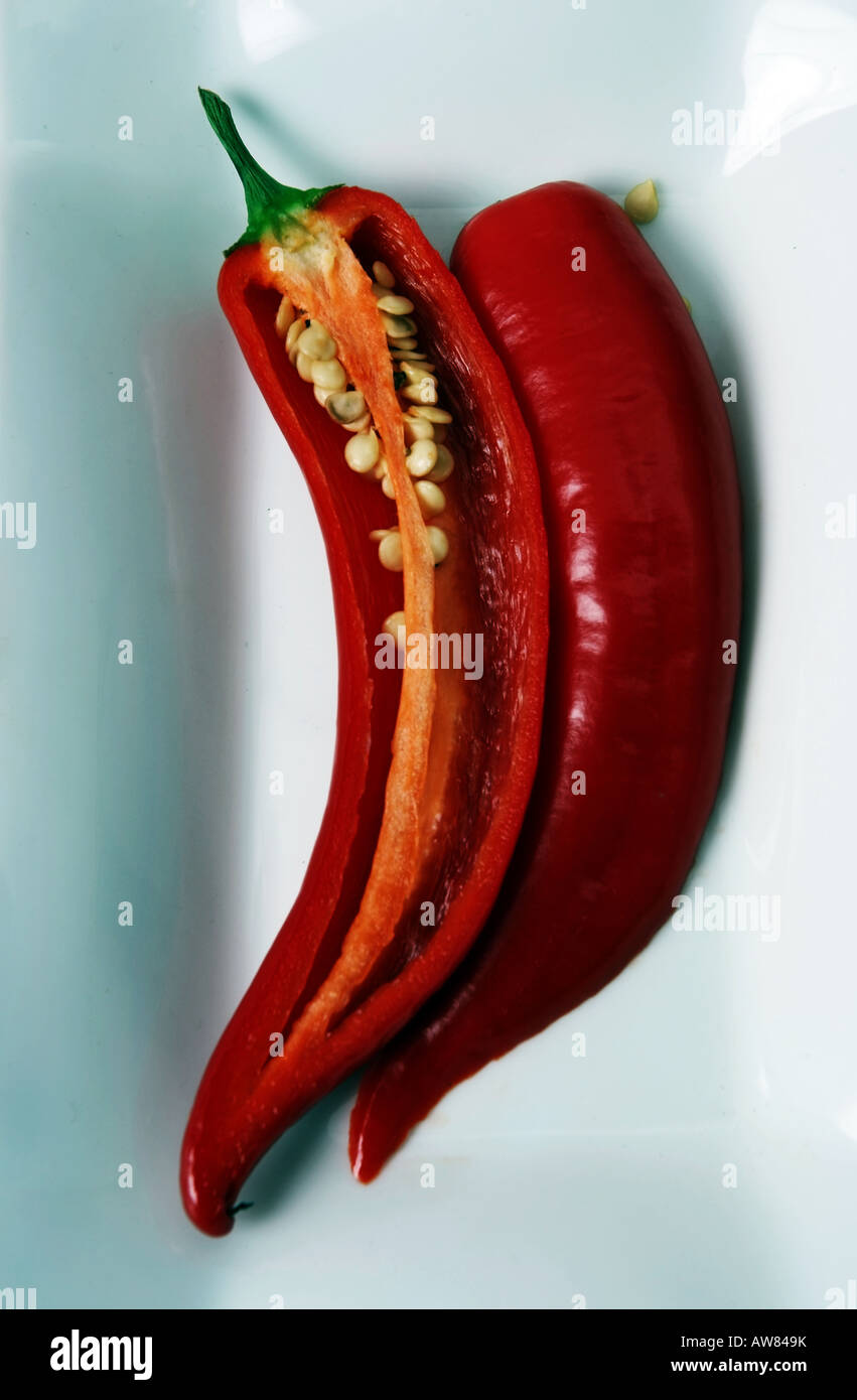 Red Chili cut in halfes Halbierte rote Chilischote Stock Photo - Alamy