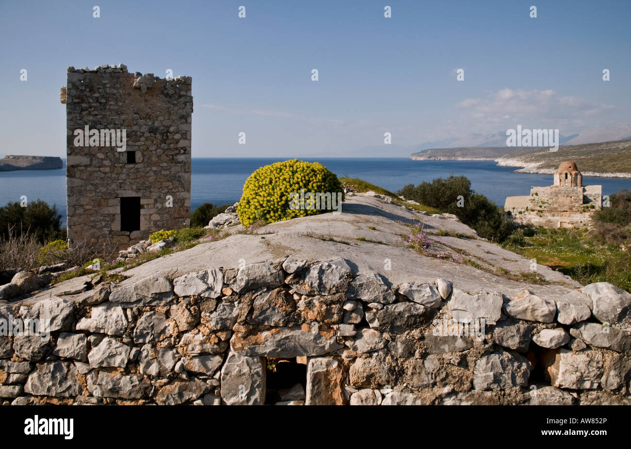 A ruined Mani tower overlooking Mezapos bay in the Deep Mani, Southern ...