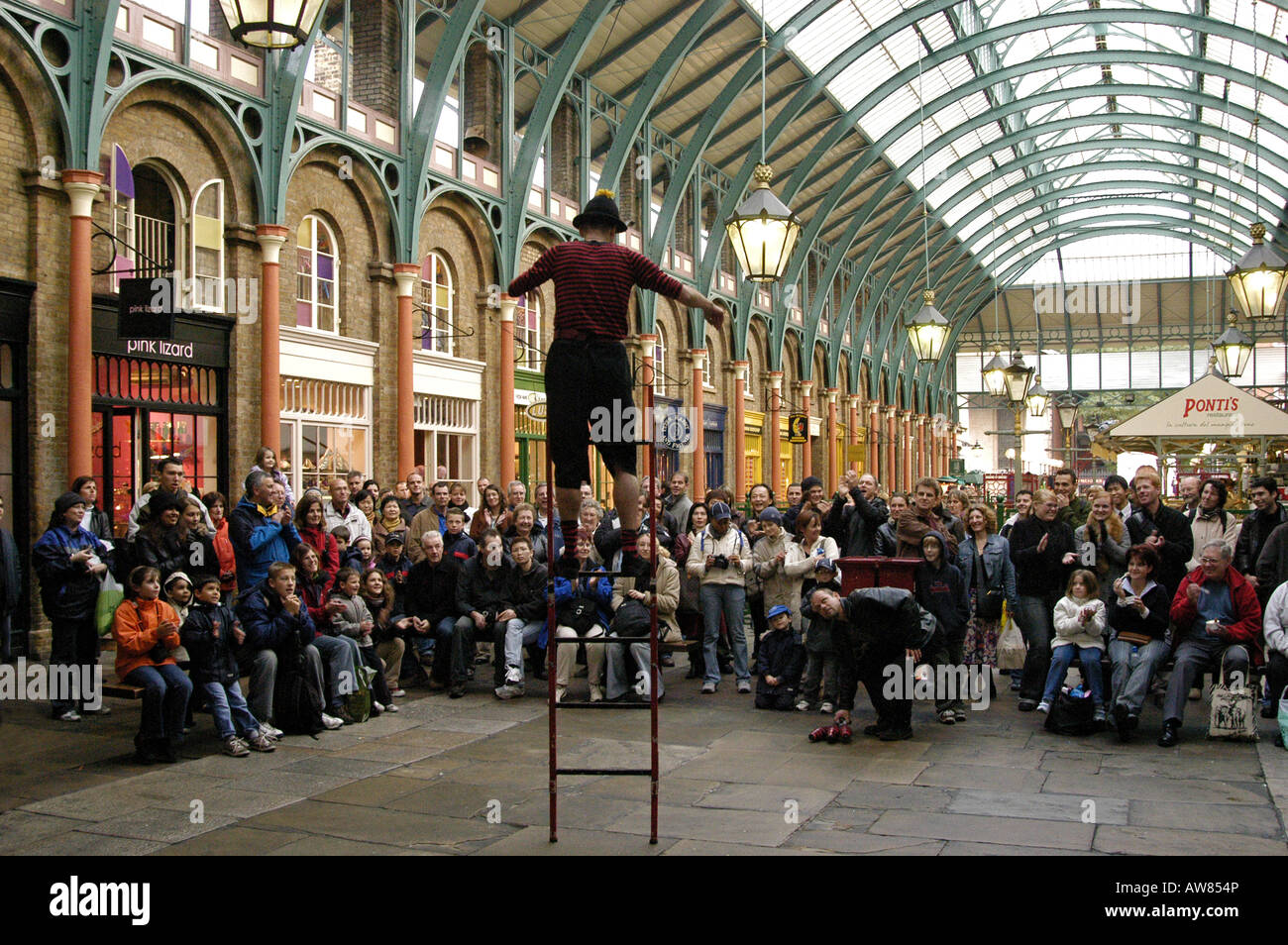 Performing acrobats in Covent Garden a popular landmark of London Stock ...