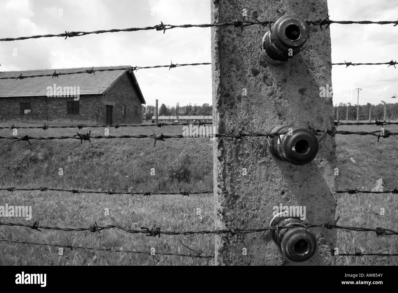 Barbed wire electrified fence at the the former Nazi concentration camp ...
