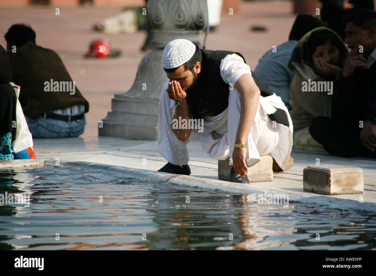 Muslim washing face hi-res stock photography and images - Alamy