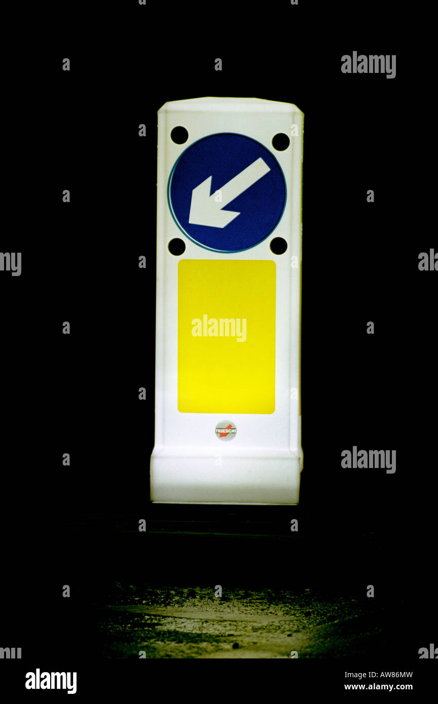 a lit bollard road sign on a pedestrian crossing Stock Photo - Alamy