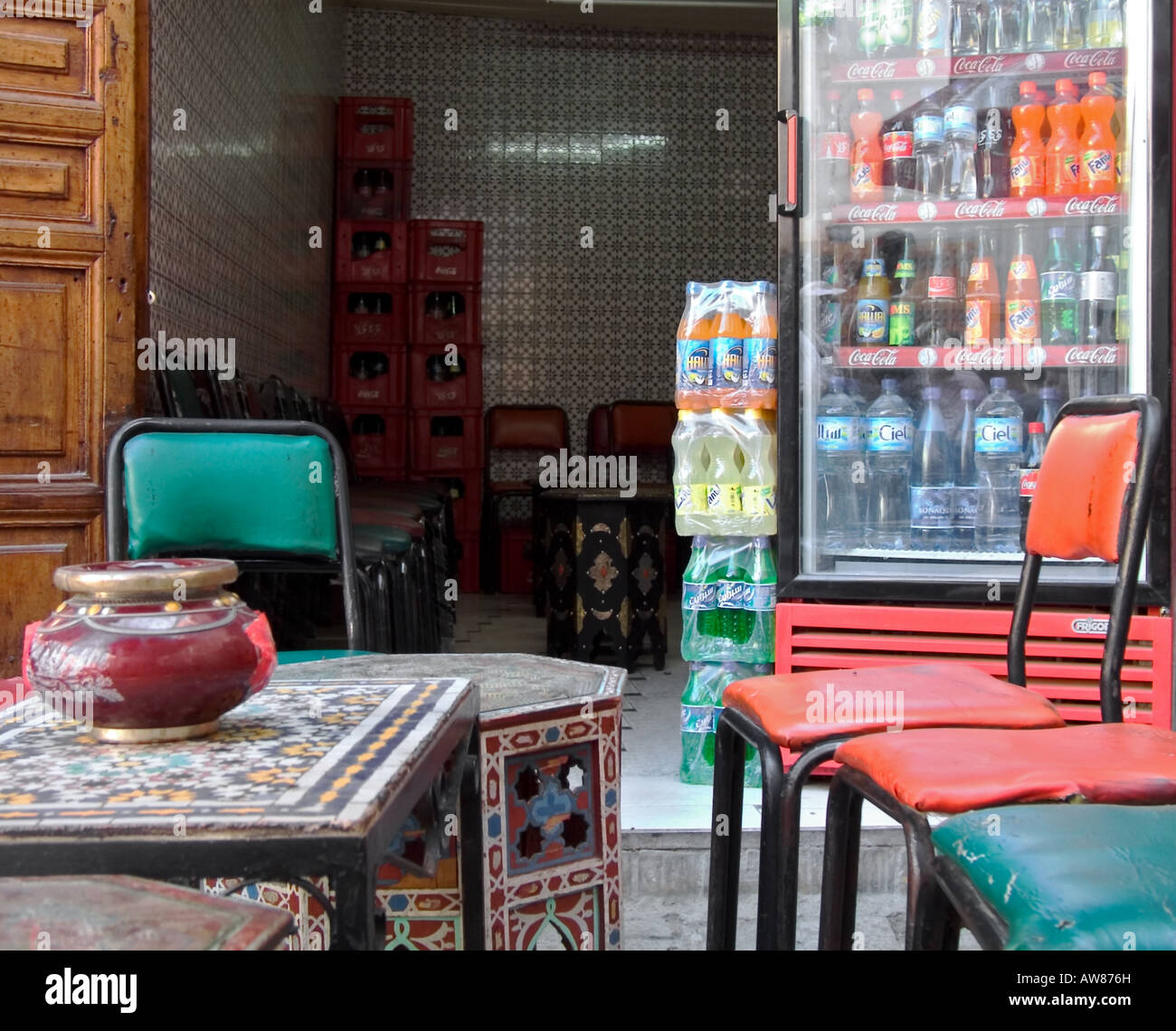 Moroccan street scene Bar with small terrace on the street selling soft ...