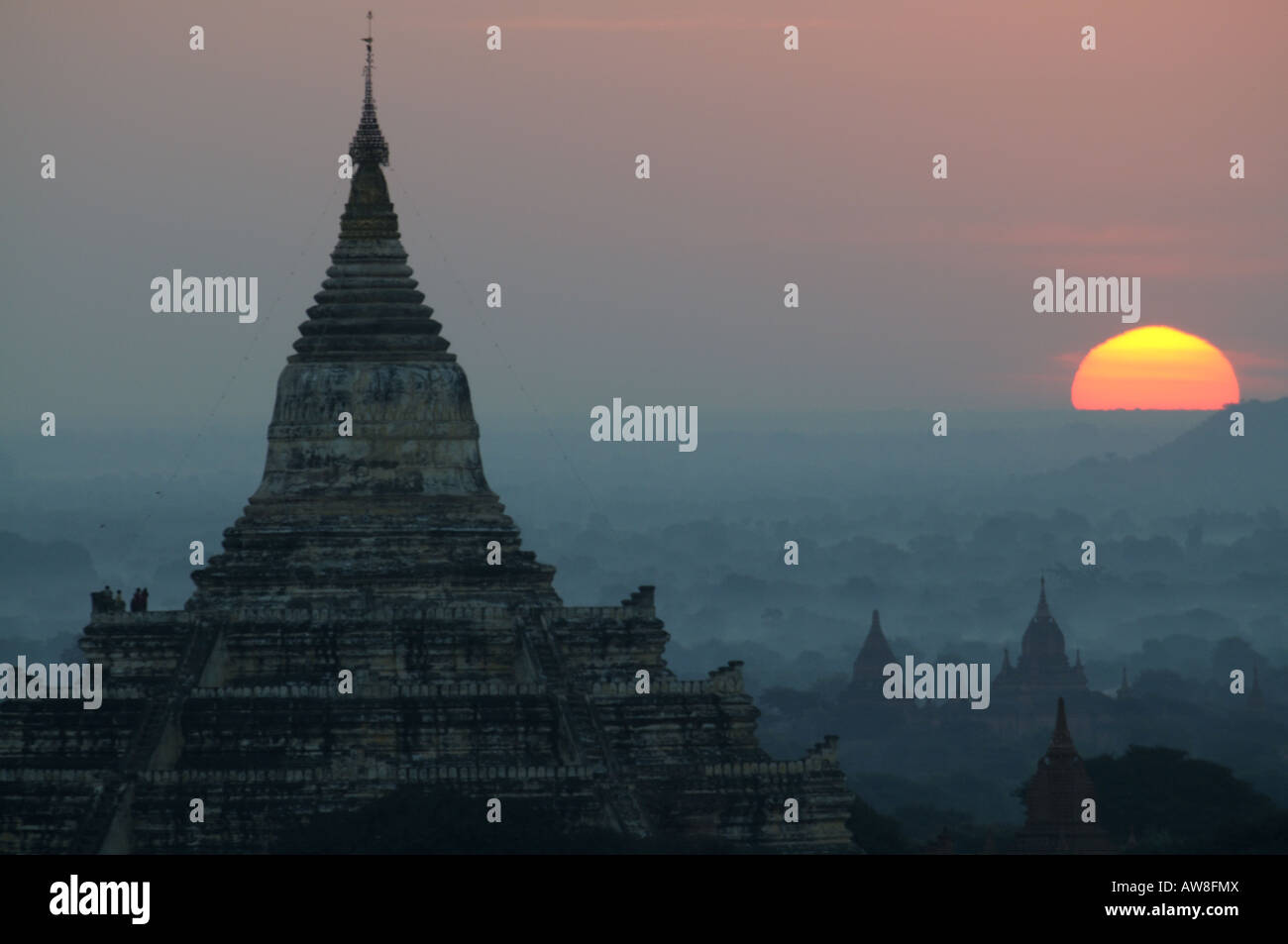 Sun rise above the temples and pagodas of the old ruined city Bagan ...